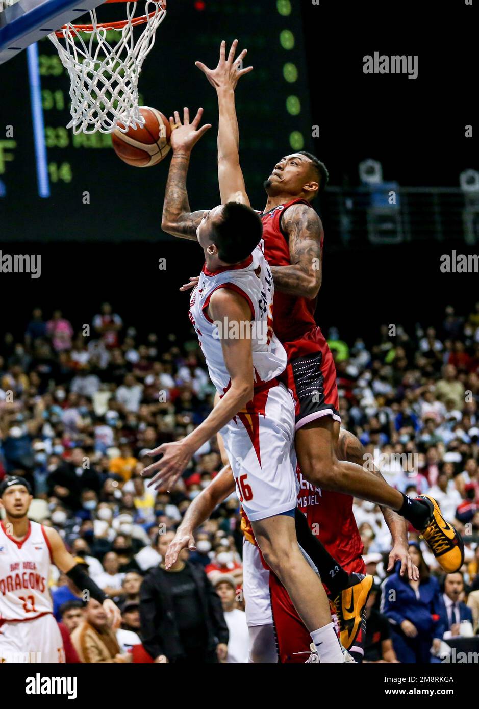 Bulacan Province. 15th Jan, 2023. Jamie Malonzo (R) of Barangay Ginebra ...