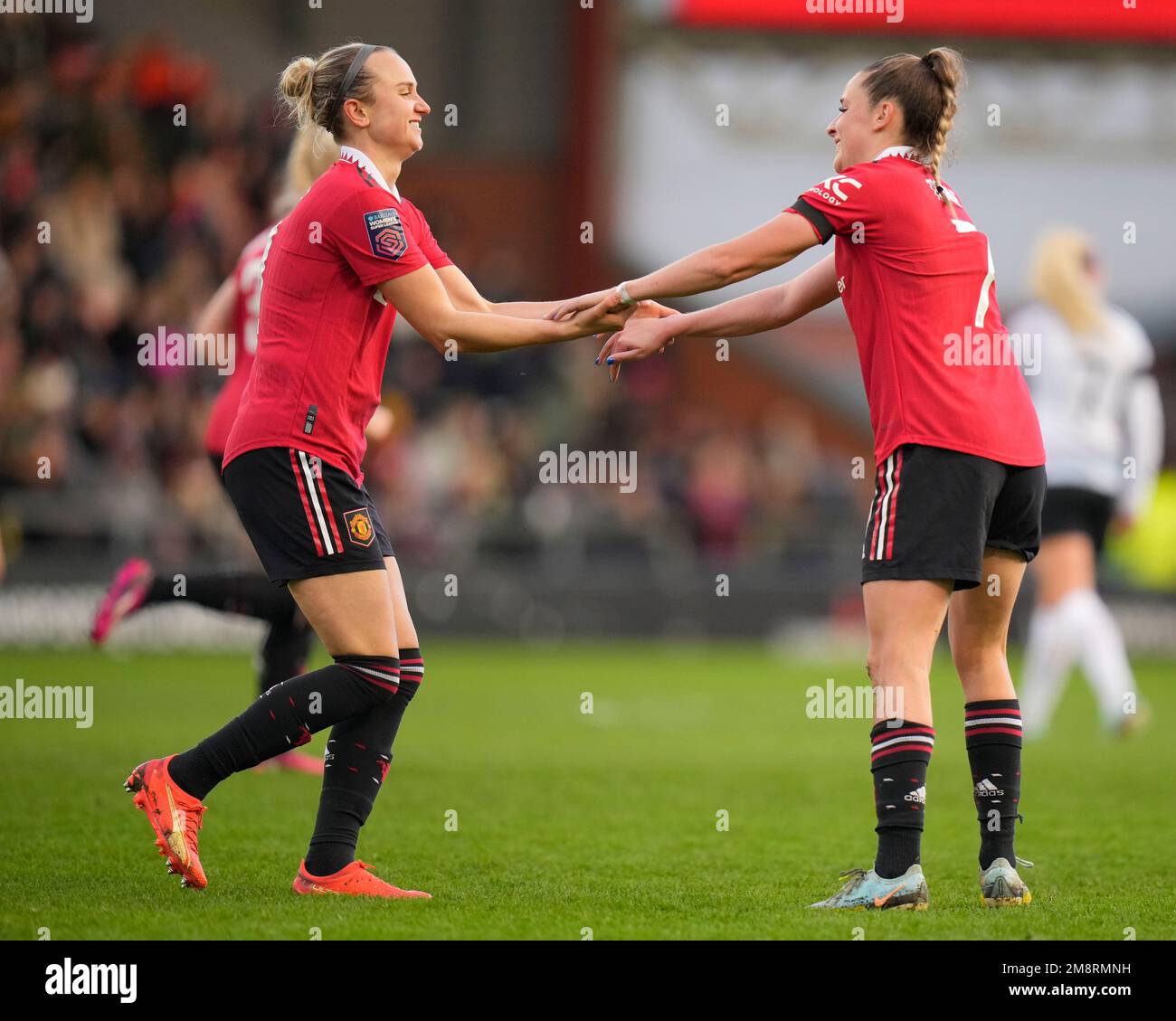 Martha Thomas #9 of Manchester United celebrates with Ella Toone after ...