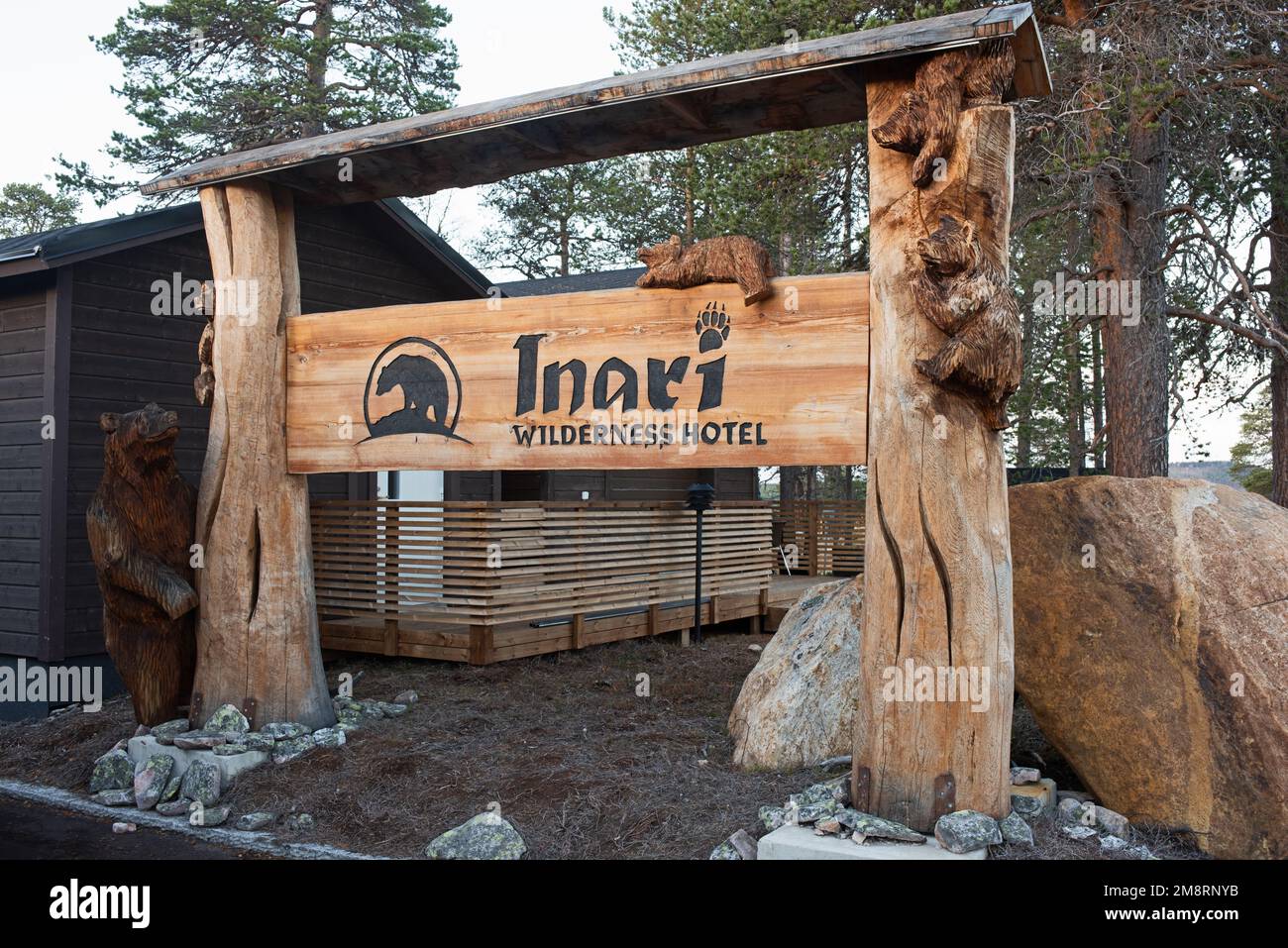The Inari Wilderness Hotel entrance with carved bears, Inari, Finland ...