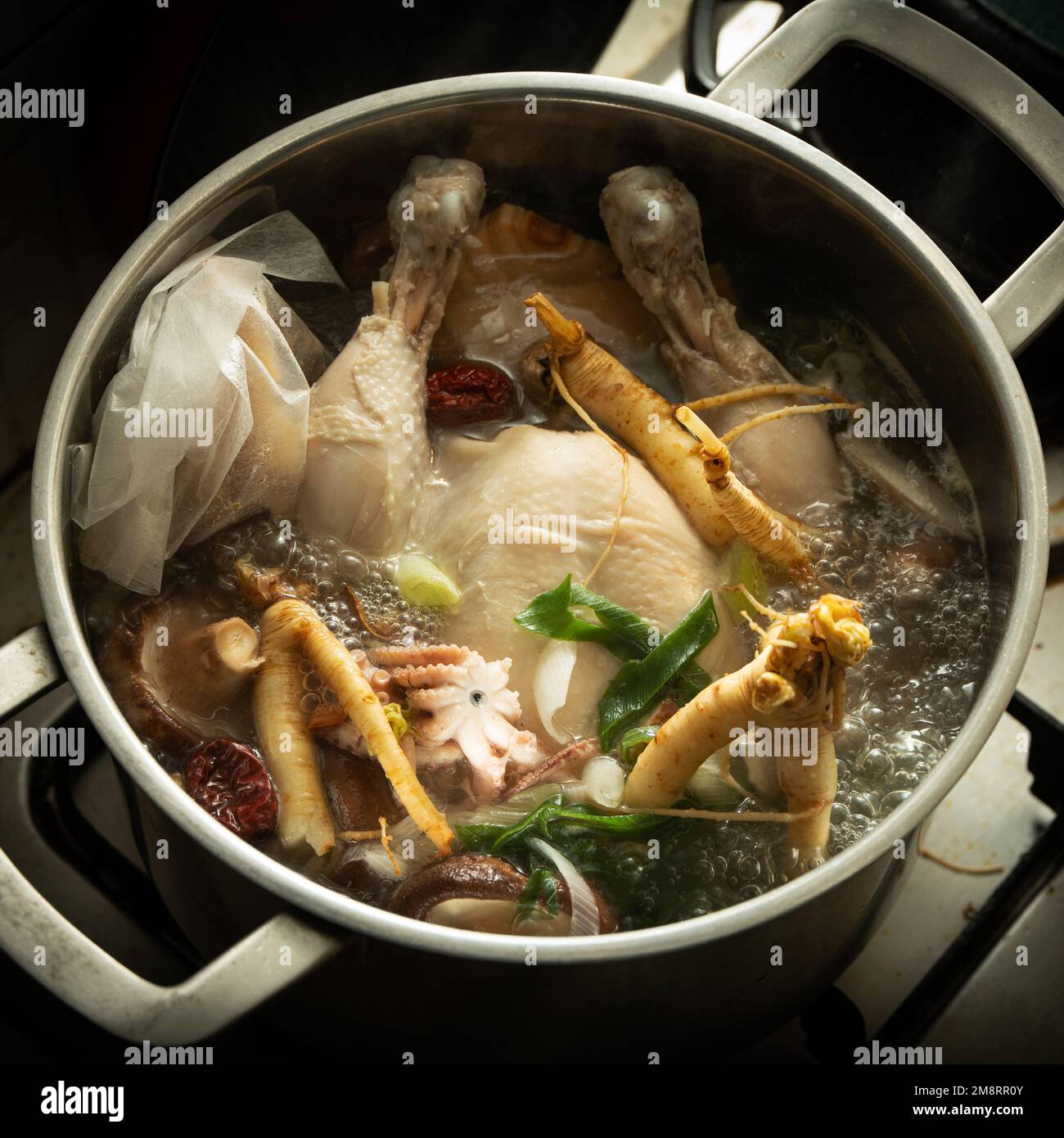 samgyetang, chicken soup with ginseng Stock Photo - Alamy