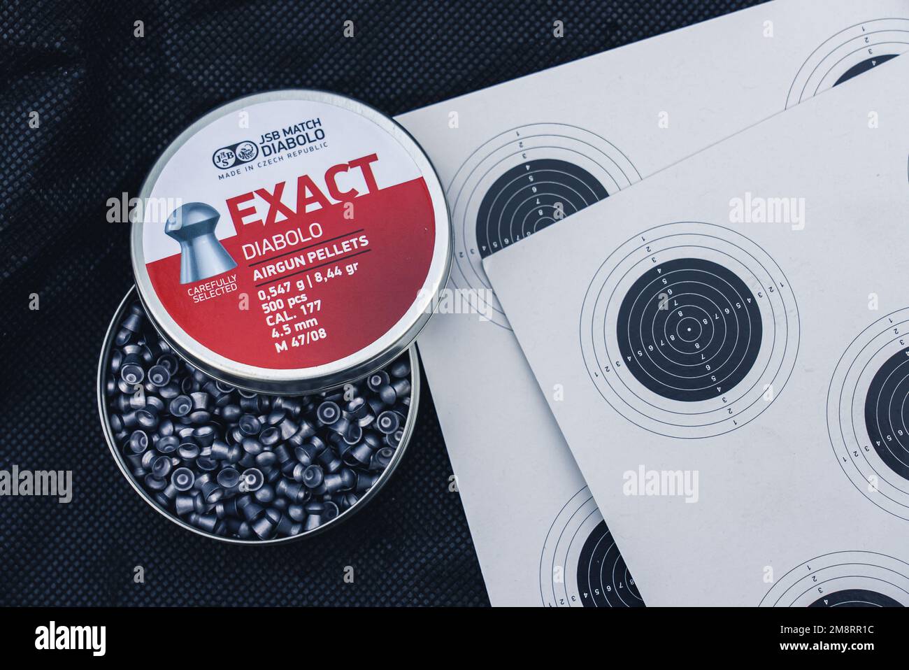 Airgun pellets and a shooting target paper for practice. High quality ...