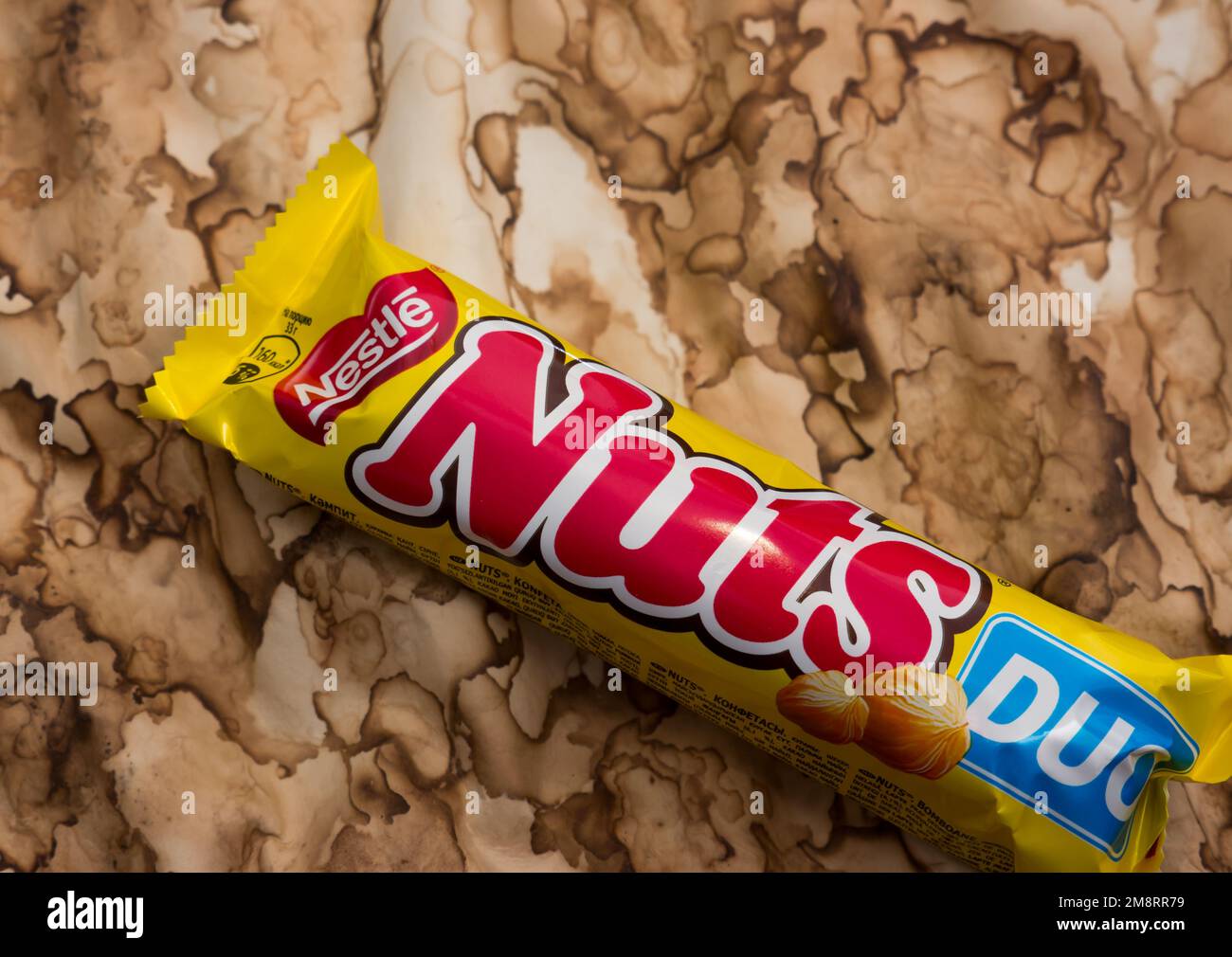 NUTS chocolate bar with hazelnuts Stock Photo - Alamy