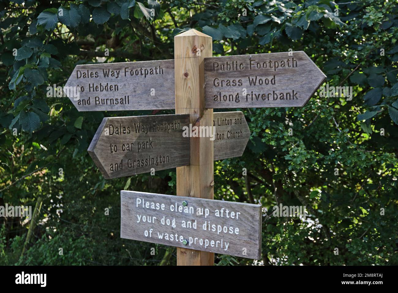 Wooden, signpost on Dales Way, Linton, Grassington Stock Photo - Alamy