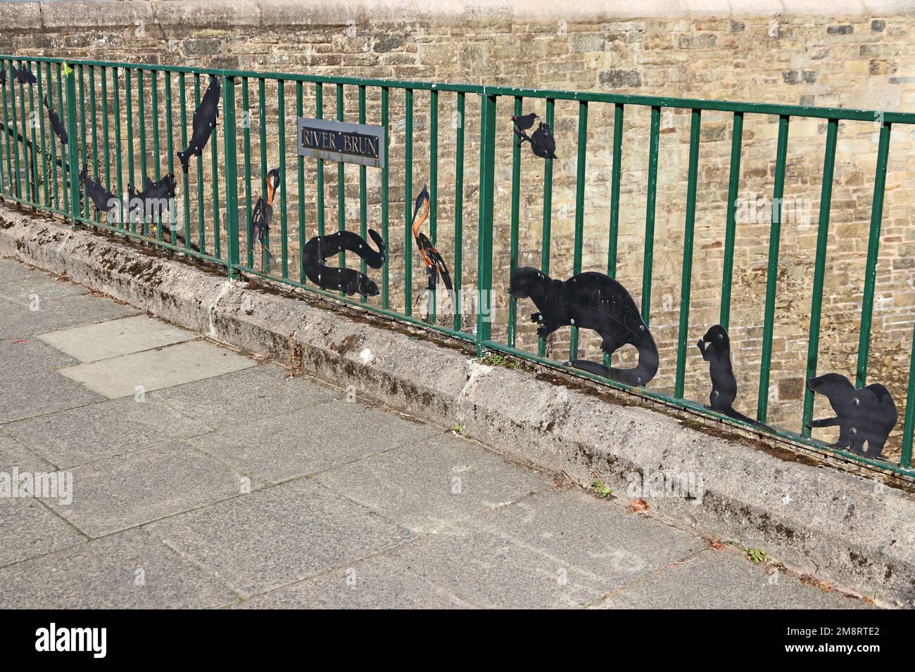 Bridge over River Bure, decorated withsculptured birds, fish and ...