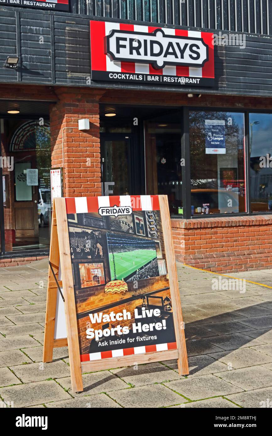Signs outside T G I Fridays restaurant, Watford Stock Photo - Alamy