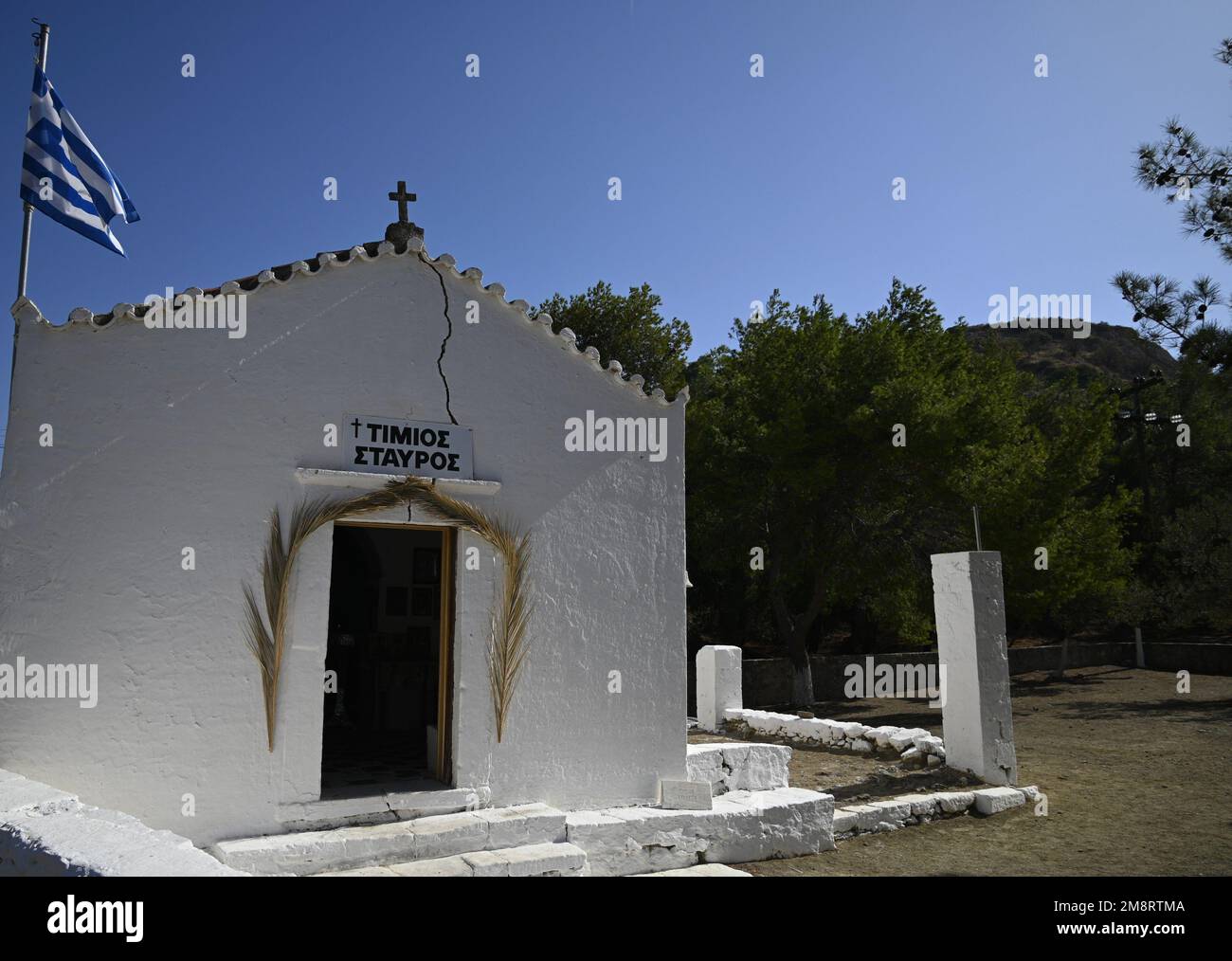 Scenic view of Timios Stavros a traditional whitewashed Greek Orthodox ...