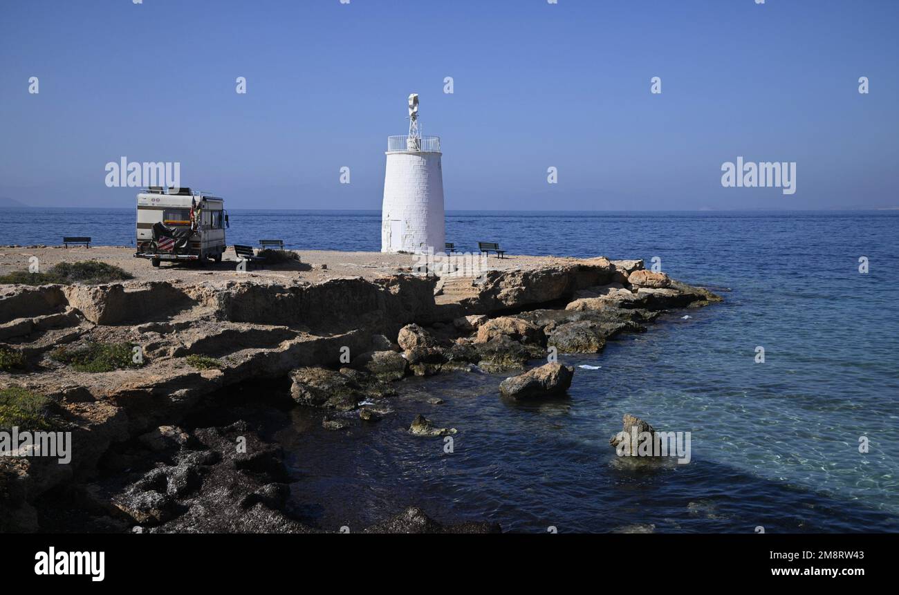 Landscape with scenic view of a vintage motorhome at Bouza's Lighthouse ...