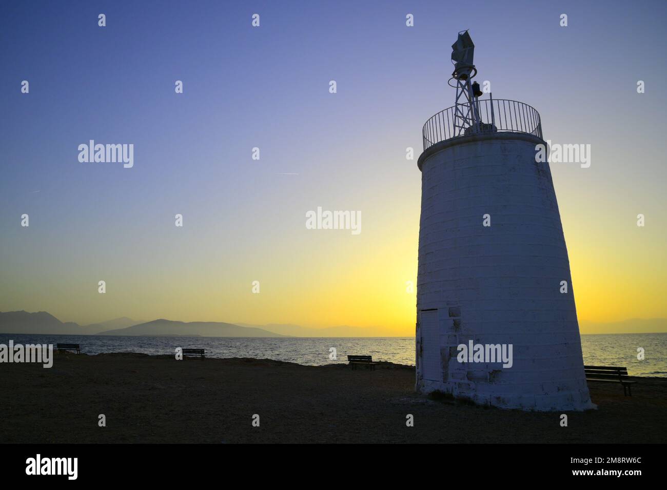 Sunset landscape with scenic view of Bouza's Lighthouse a historic ...