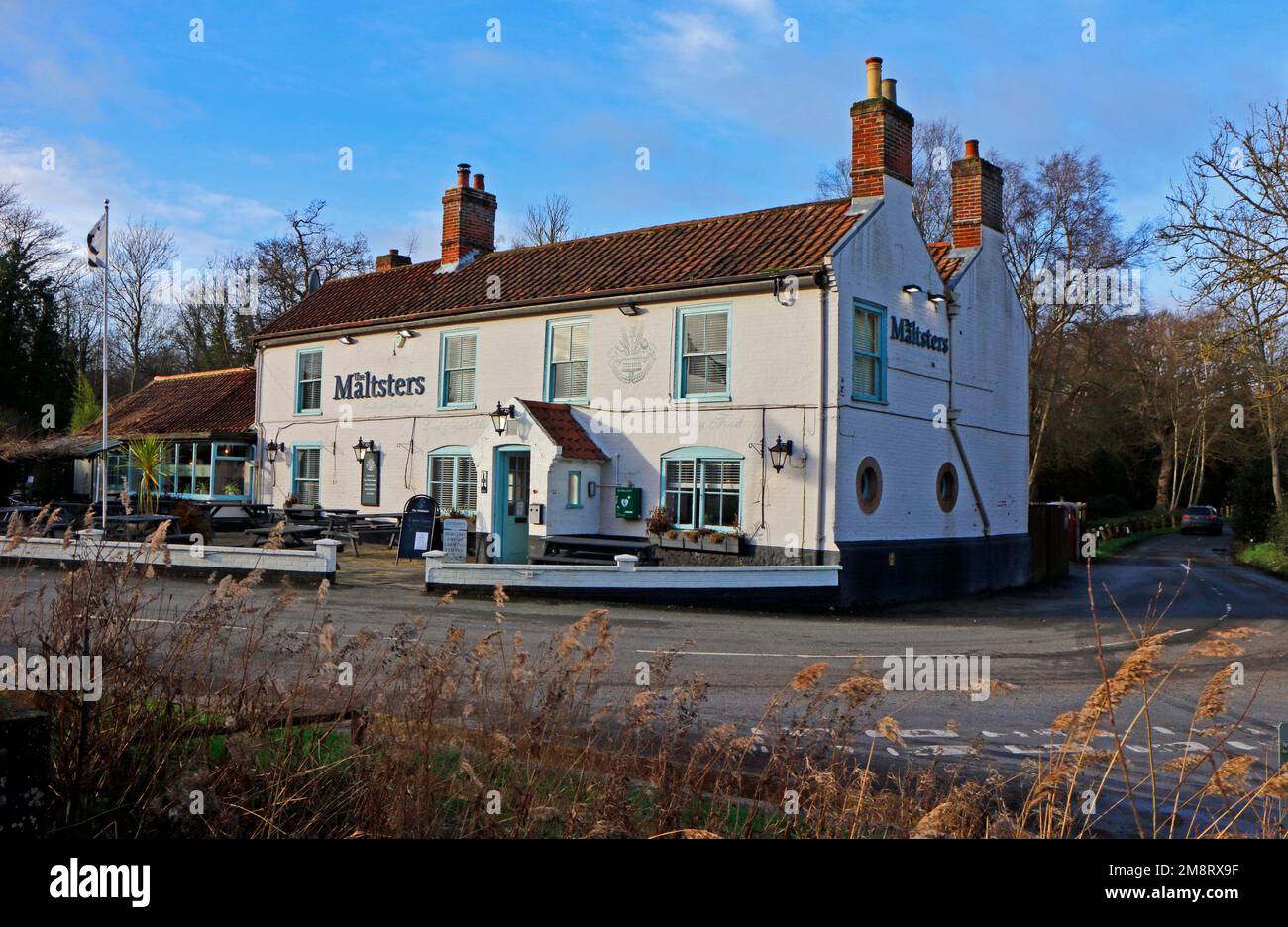 A view of the Maltsters public house by Malthouse Broad on the Norfolk ...