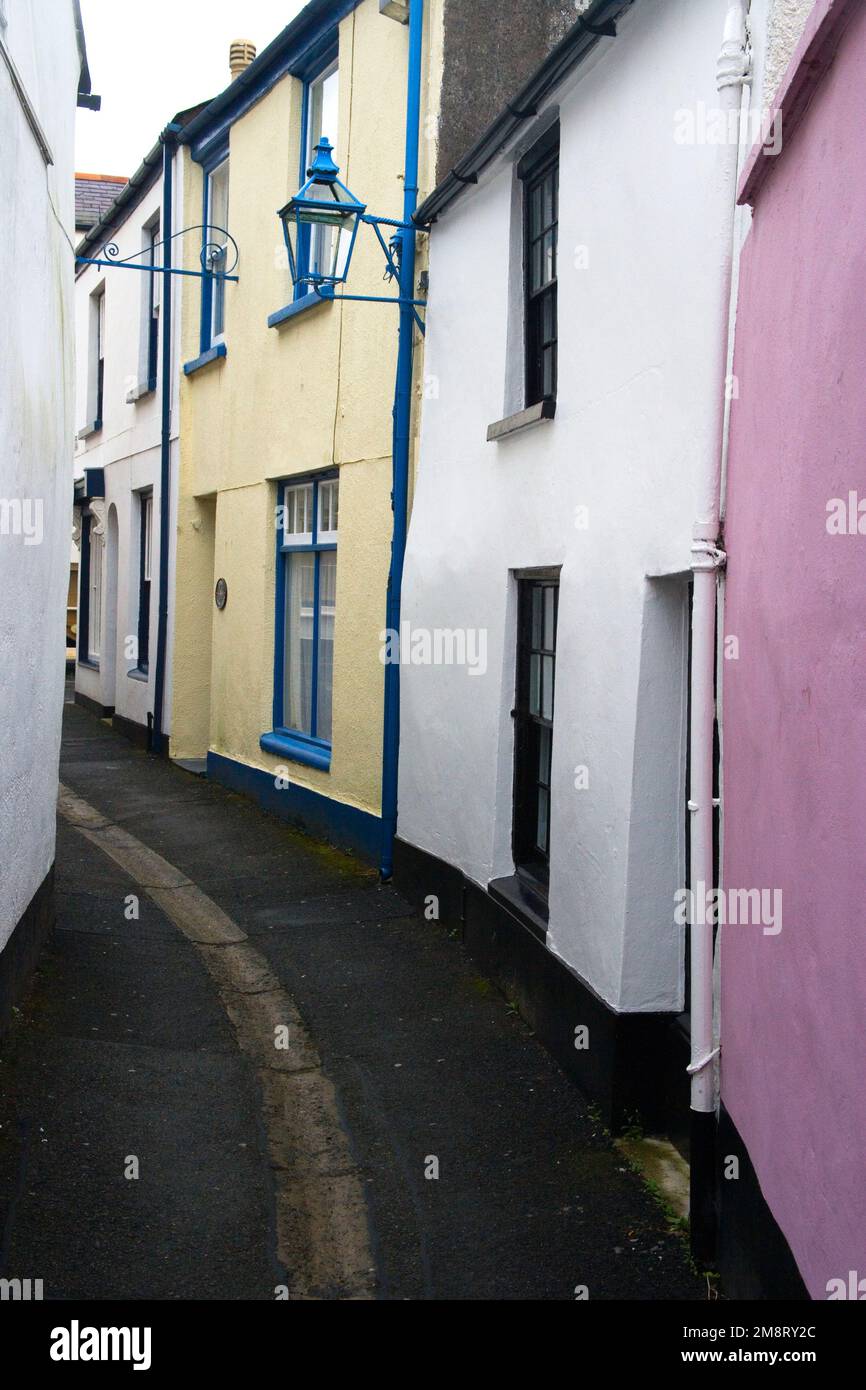 brightly painted houses and narrow streets wind through the village of ...