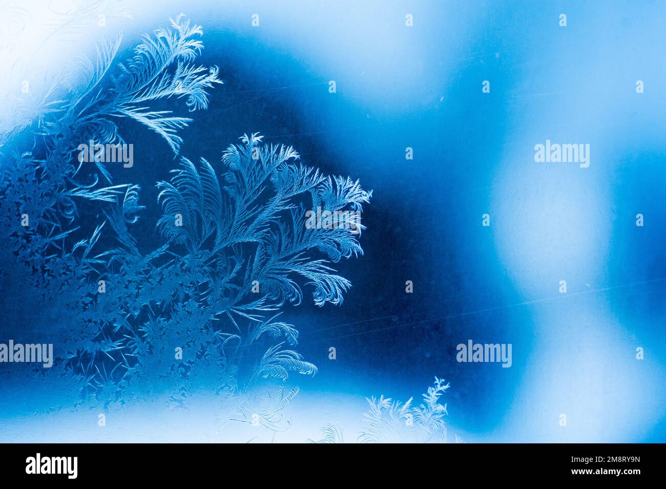 A 3d rendered illustration of snow frost on windows isolated on a blue ...
