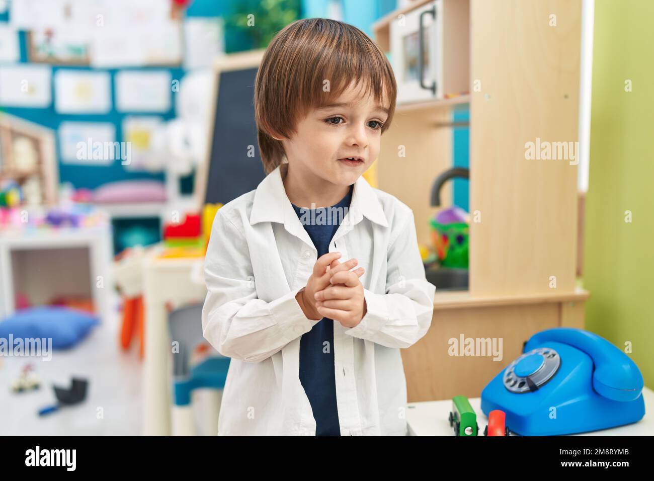 Adorable toddler smiling confident standing at kindergarten Stock Photo - Alamy