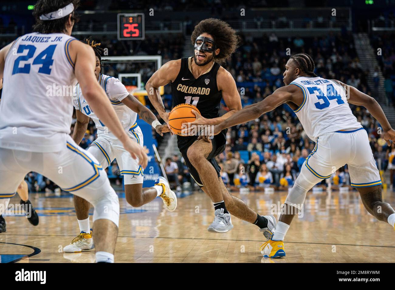 Colorado Buffaloes guard Javon Ruffin (11) gets past UCLA Bruins guard ...