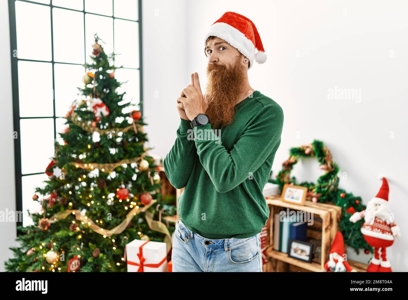Santa holding gun hi-res stock photography and images - Alamy