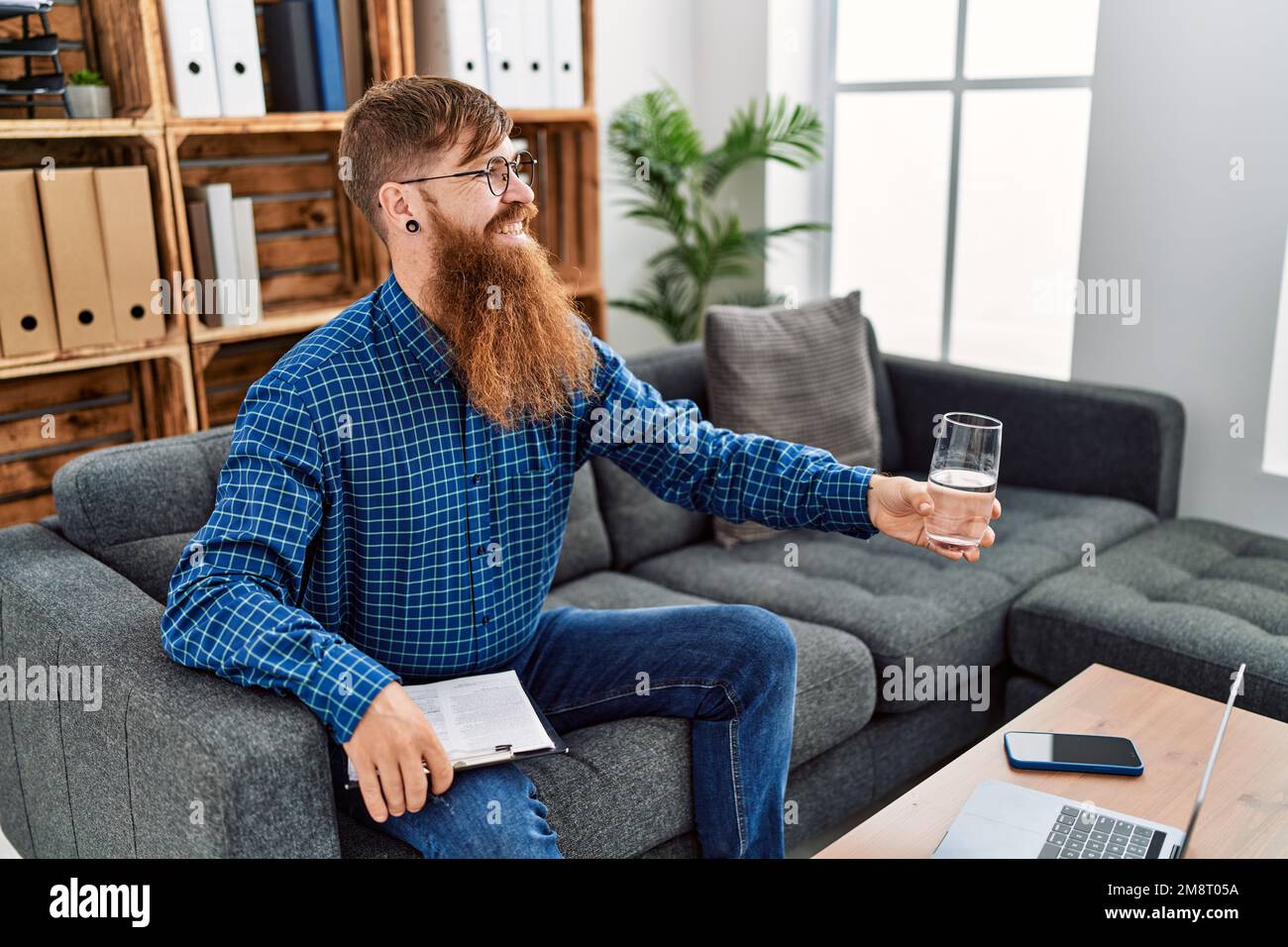 Doctor offering glass water hi-res stock photography and images - Alamy