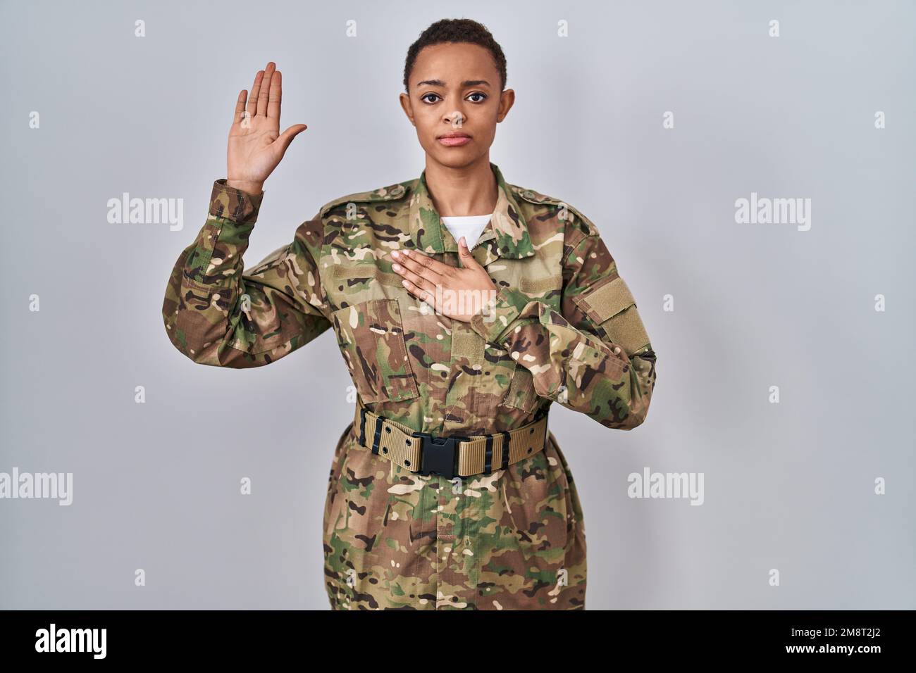 Beautiful african american woman wearing camouflage army uniform ...