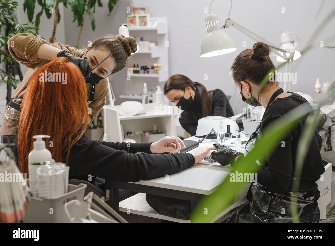 Beauty service express. Beautiful ginger girl enjoying beauty routines ...