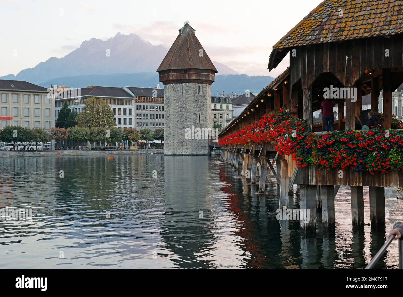Chapel bridge (Kapelbrücke) and Water Tower across the river Reuss ...