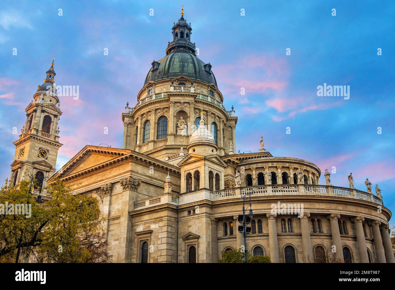 Scenic St. Stephen's Basilica building exterior at sunset in Budapest ...