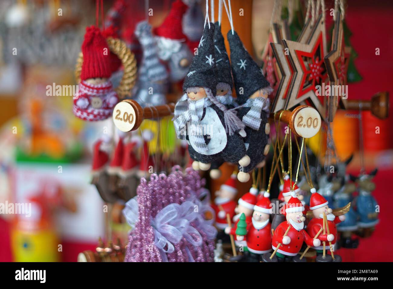 Christmas Santa's on sale in winter market stalls, Germany, Winter 2022 ...
