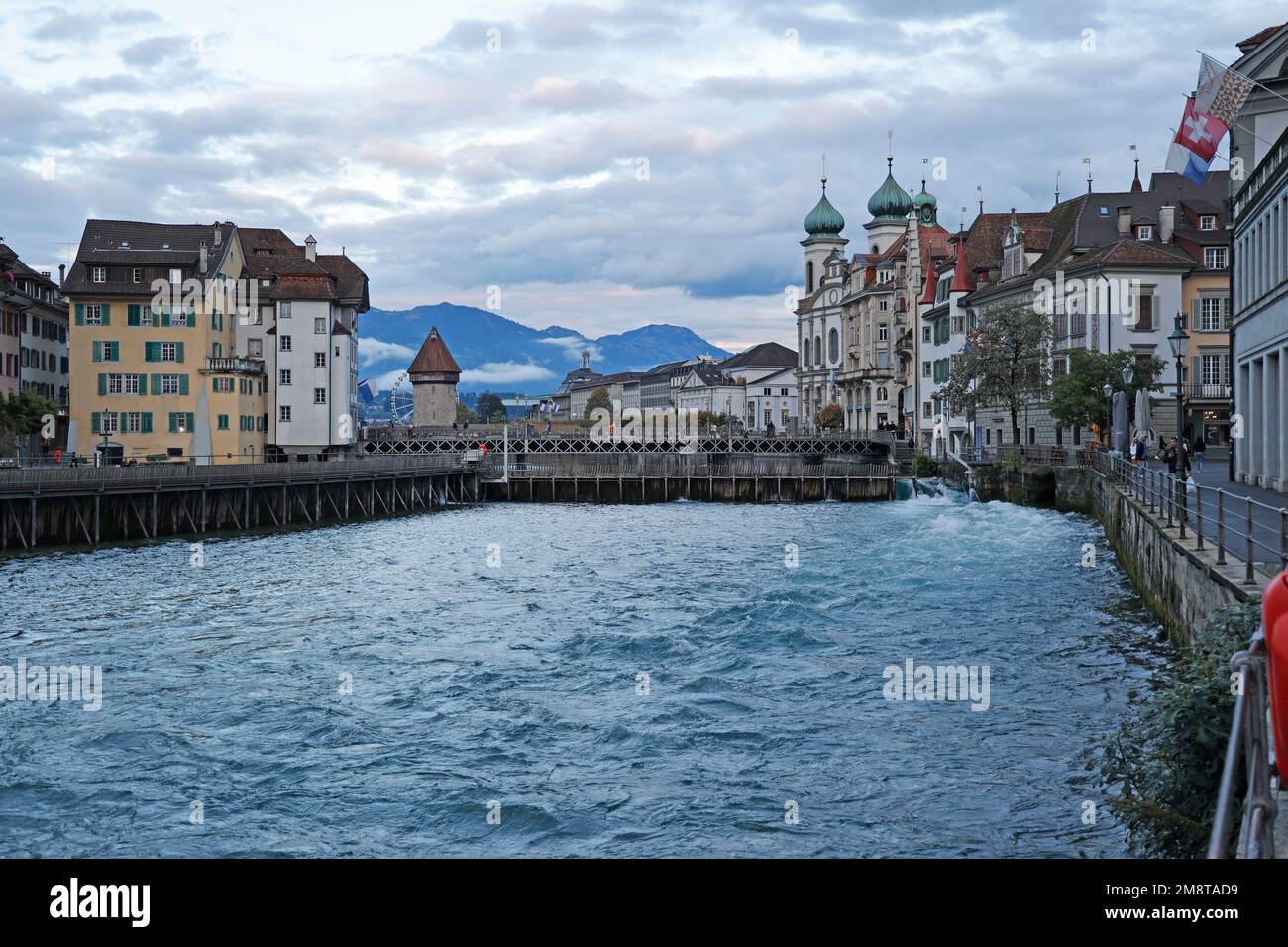 The Spreuer Bridge, or Chaff Bridge and weir across river Reuss with ...