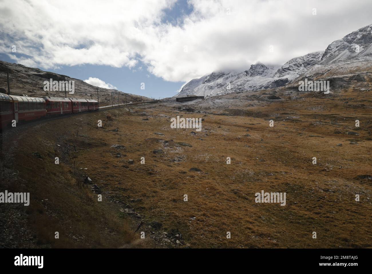 Bernina Express train crossing the Alps, Switzerland Stock Photo - Alamy