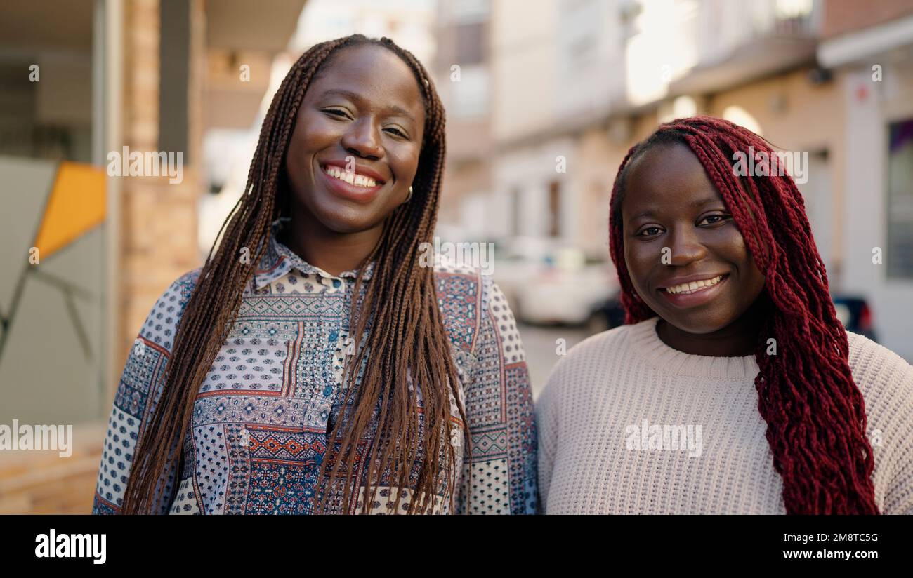 Two african american friends smiling confident standing together at ...