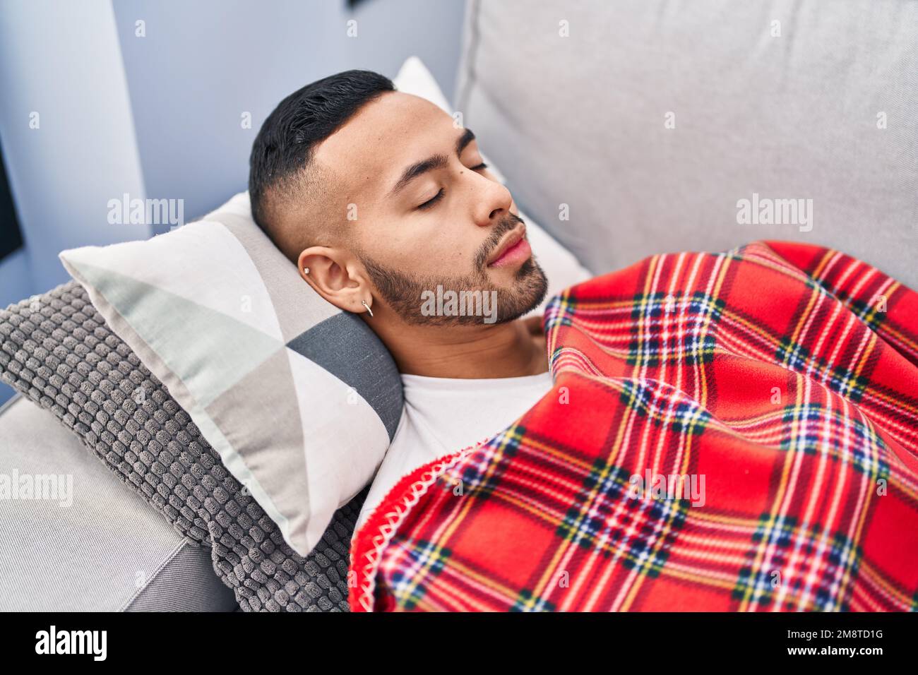African american man lying on bed sleeping at home Stock Photo - Alamy