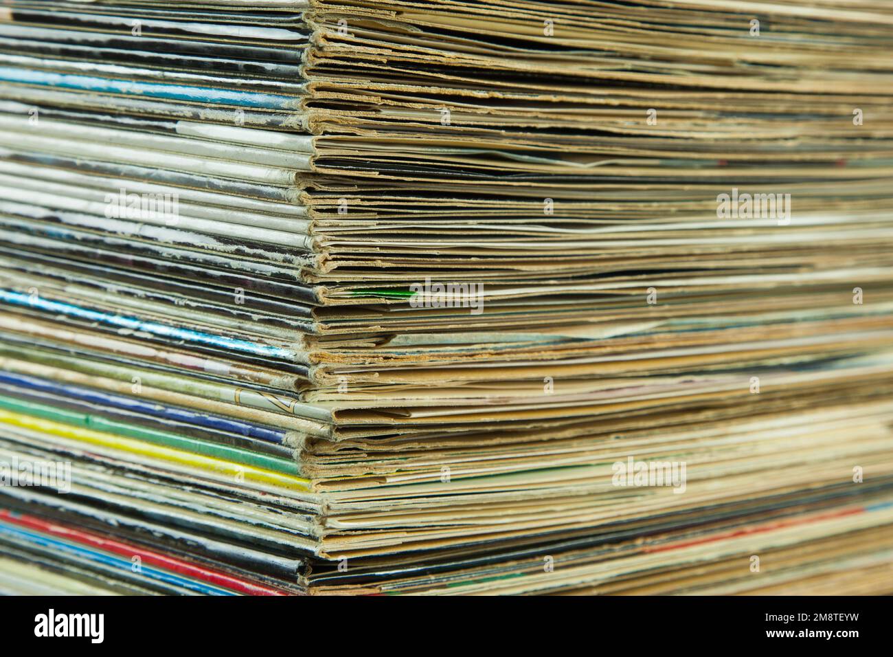 A stack of old LP record covers. Art and a piece of contemporary ...