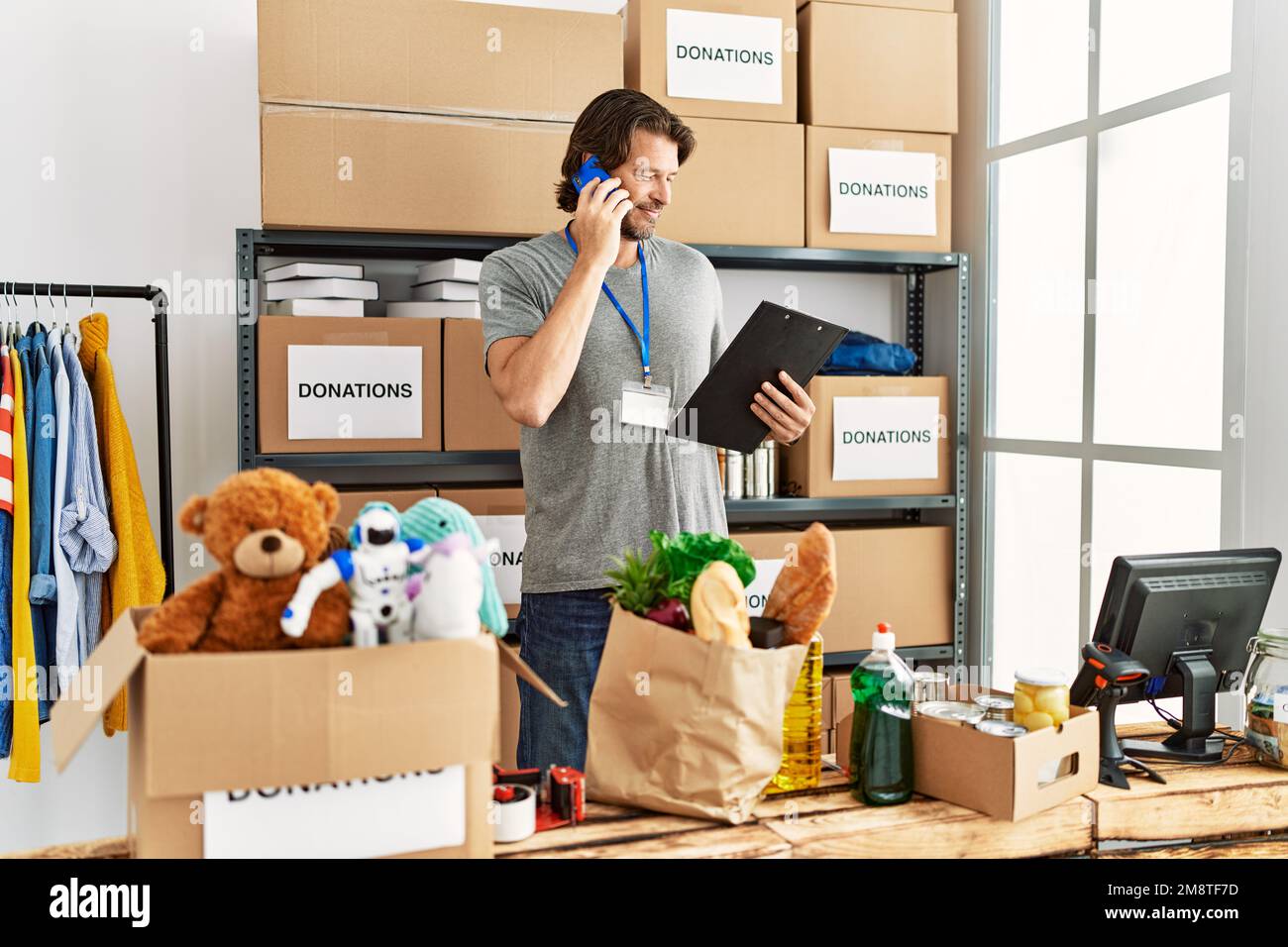 Middle age caucasian man smiling confident talking on the smartphone at ...