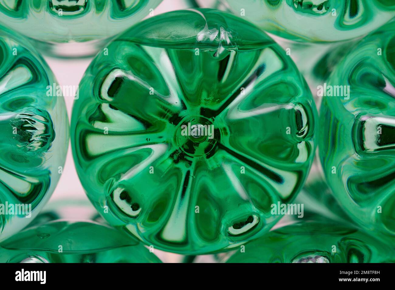 The beauty of the shape from the bottom of a stacked plastic bottle ...