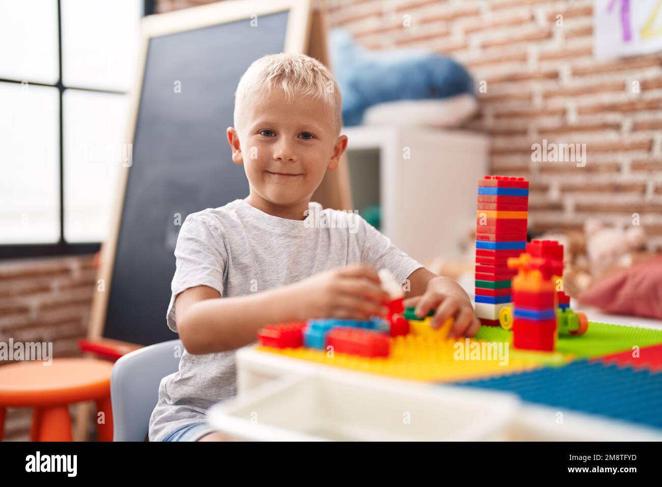 Baby, blocks, smile hi-res stock photography and images - Alamy