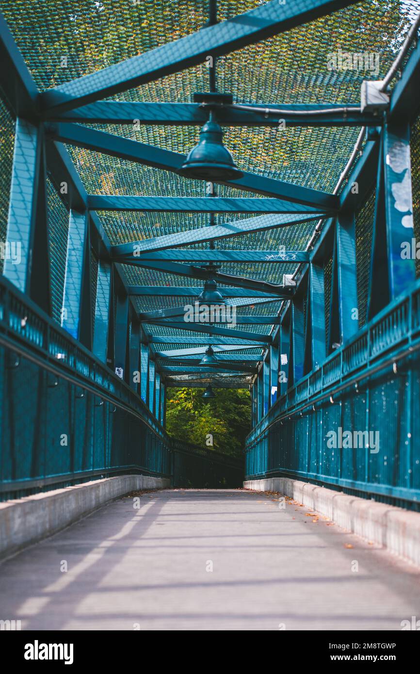 A vertical shot of a walking bridge Stock Photo - Alamy