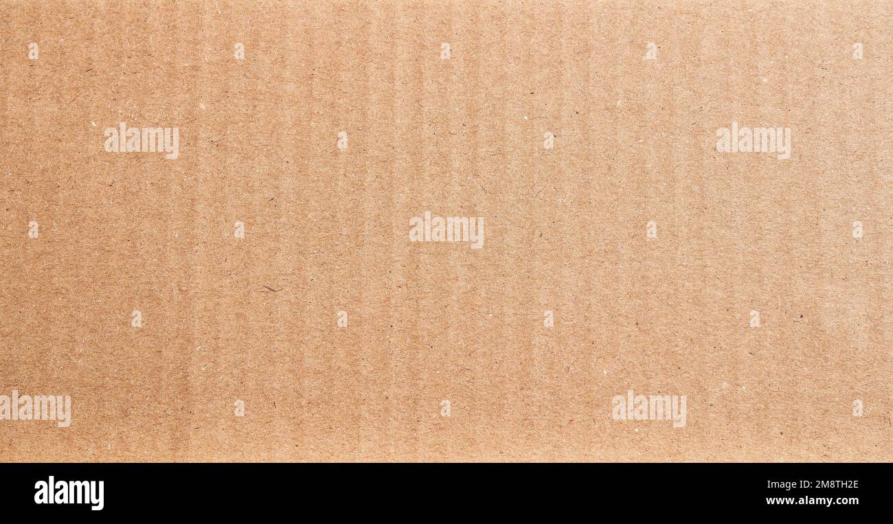 Brown cardboard carton material texture background Stock Photo - Alamy