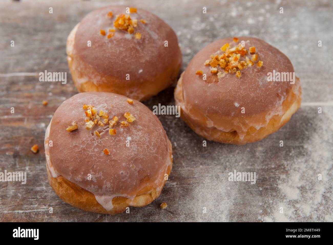 Donuts for Fat Thursday. Polish tradition - fresh donuts with icing and ...