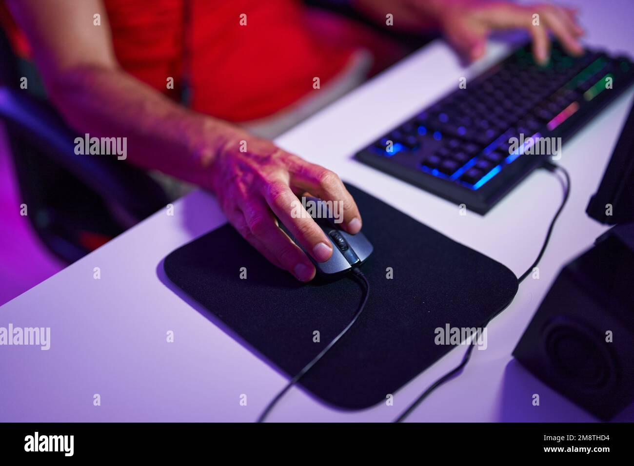 Middle age man using computer keyboard and mouse at gaming room Stock ...