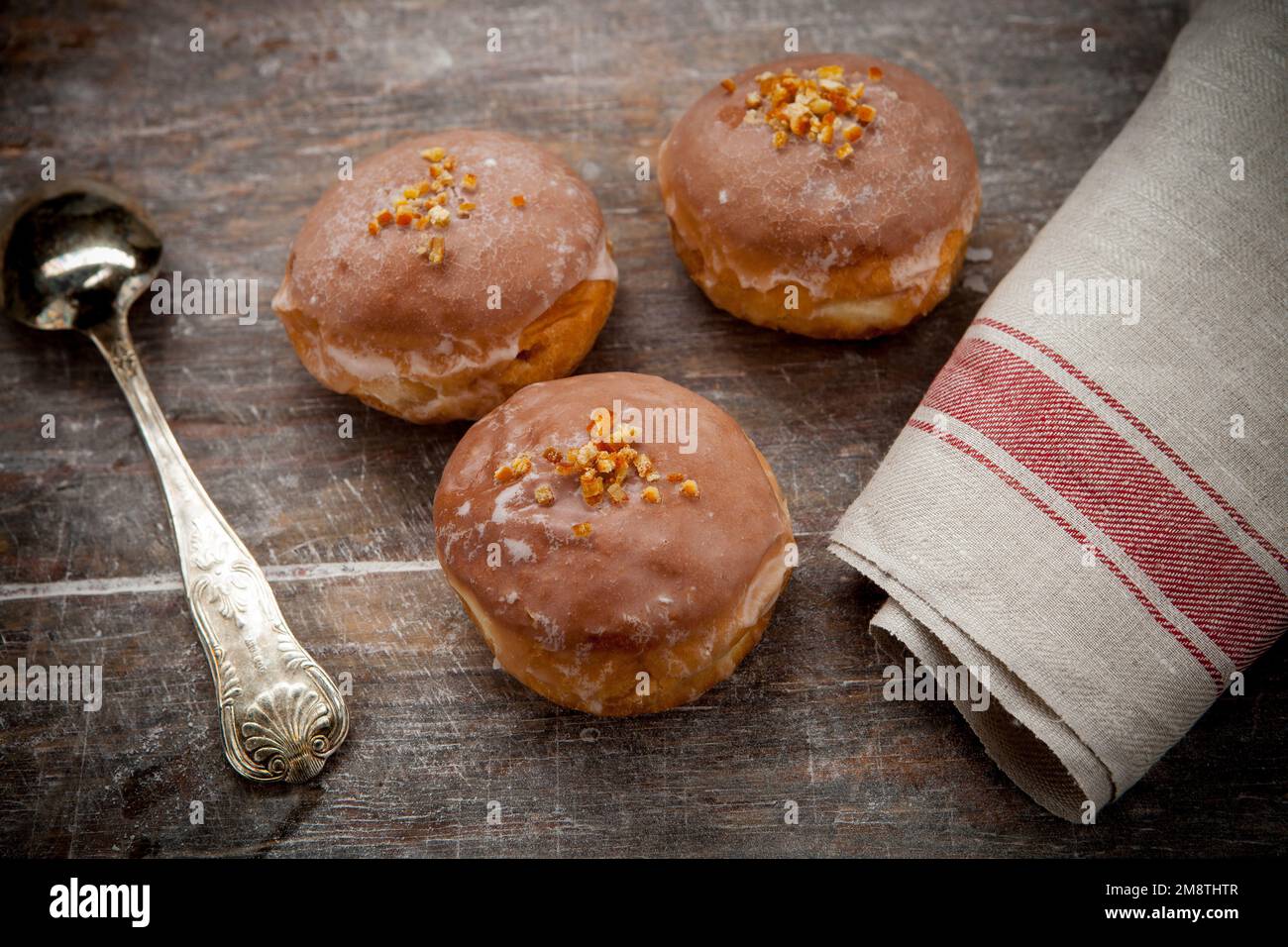 Donuts for Fat Thursday. Polish tradition - fresh donuts with icing and ...