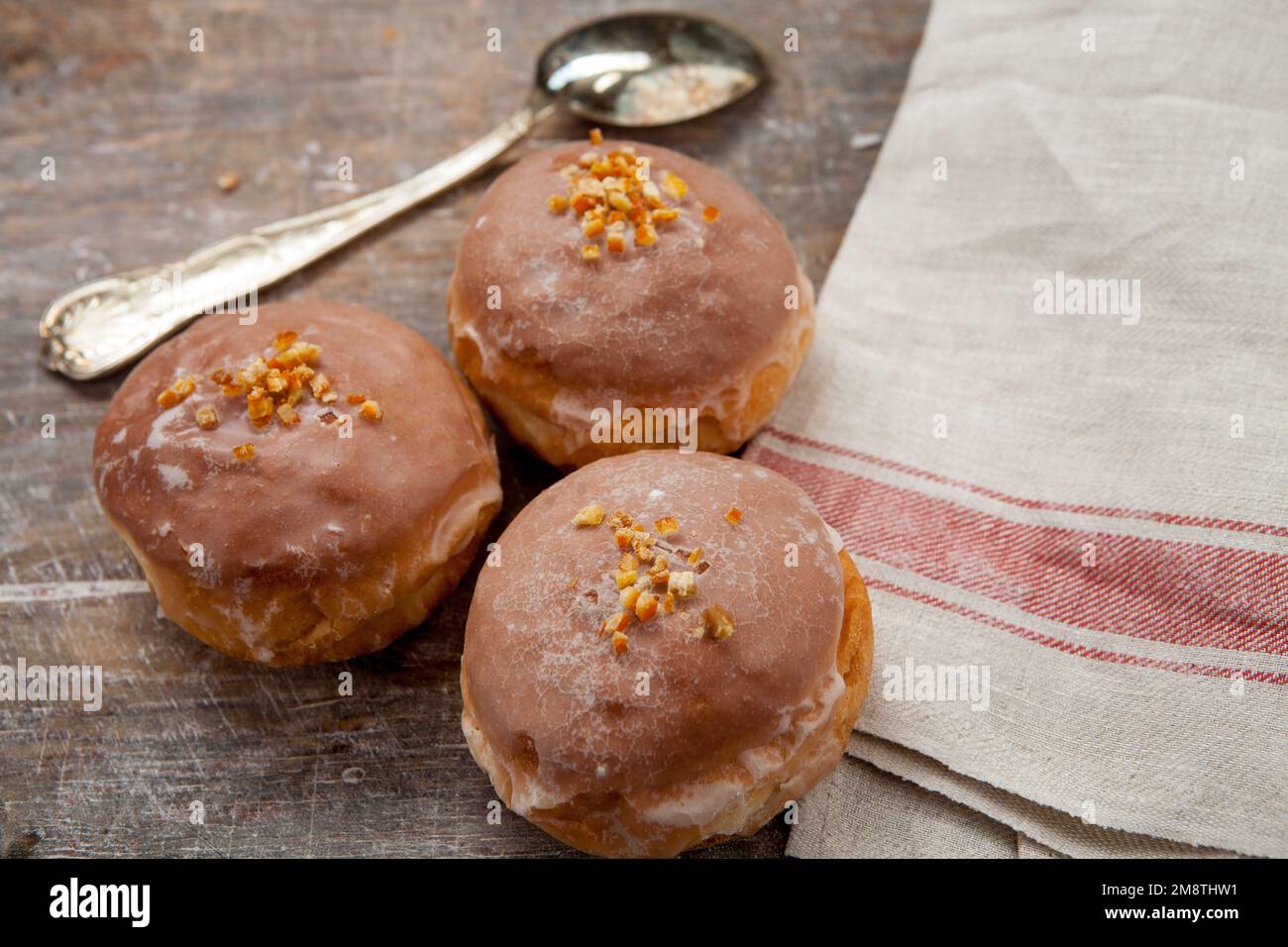 Fat Thursday. Photos of donuts with cherry filling and icing. Donuts ...