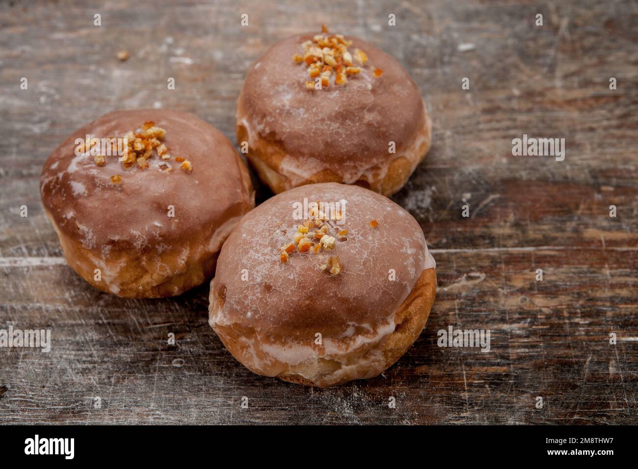 Donuts for Fat Thursday. Polish tradition - fresh donuts with icing and ...