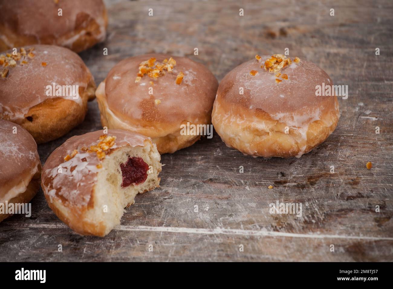 Fat Thursday. Photos of donuts with cherry filling and icing. Donuts ...
