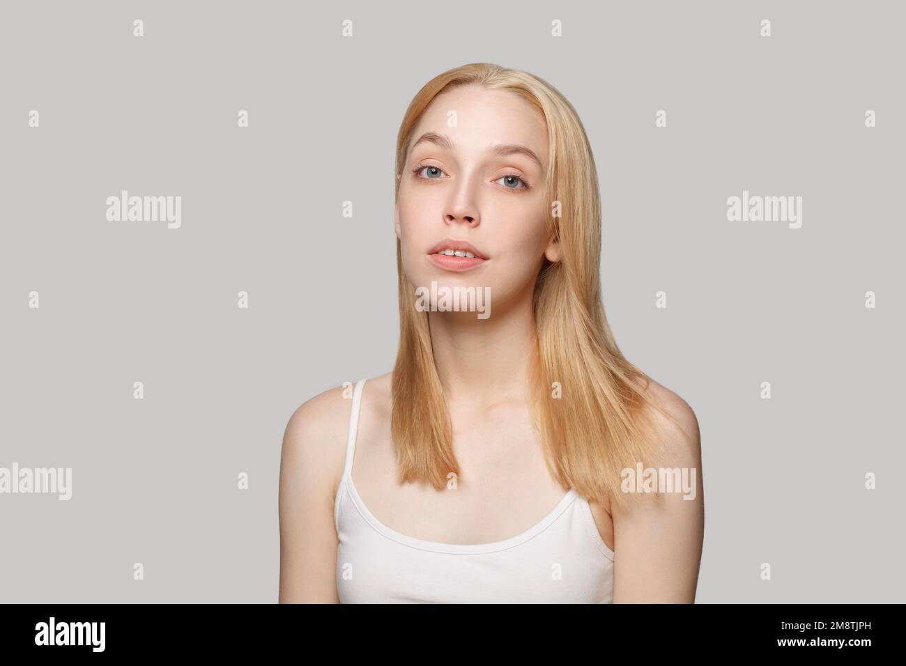 Attractive fashion model woman face on white background Stock Photo - Alamy