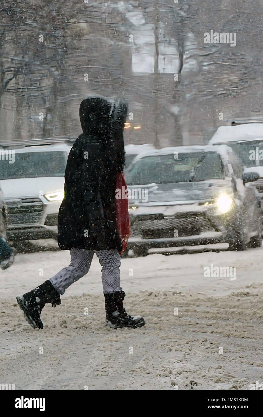 Woman in snowstorm hi-res stock photography and images - Alamy