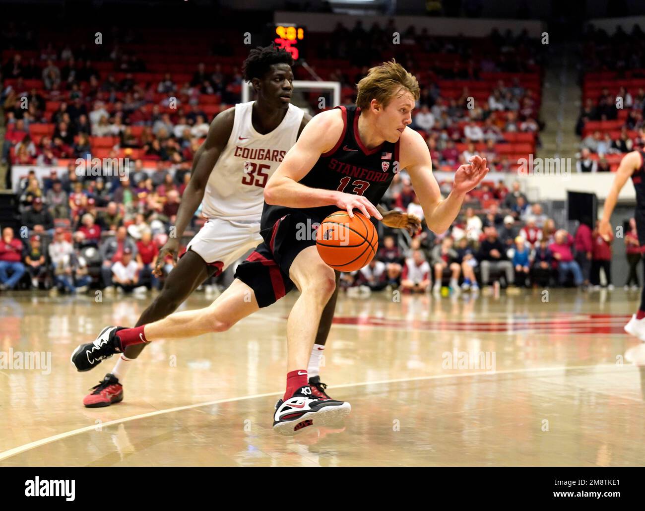 Stanford guard Michael Jones (13) drives to towards the basket after ...