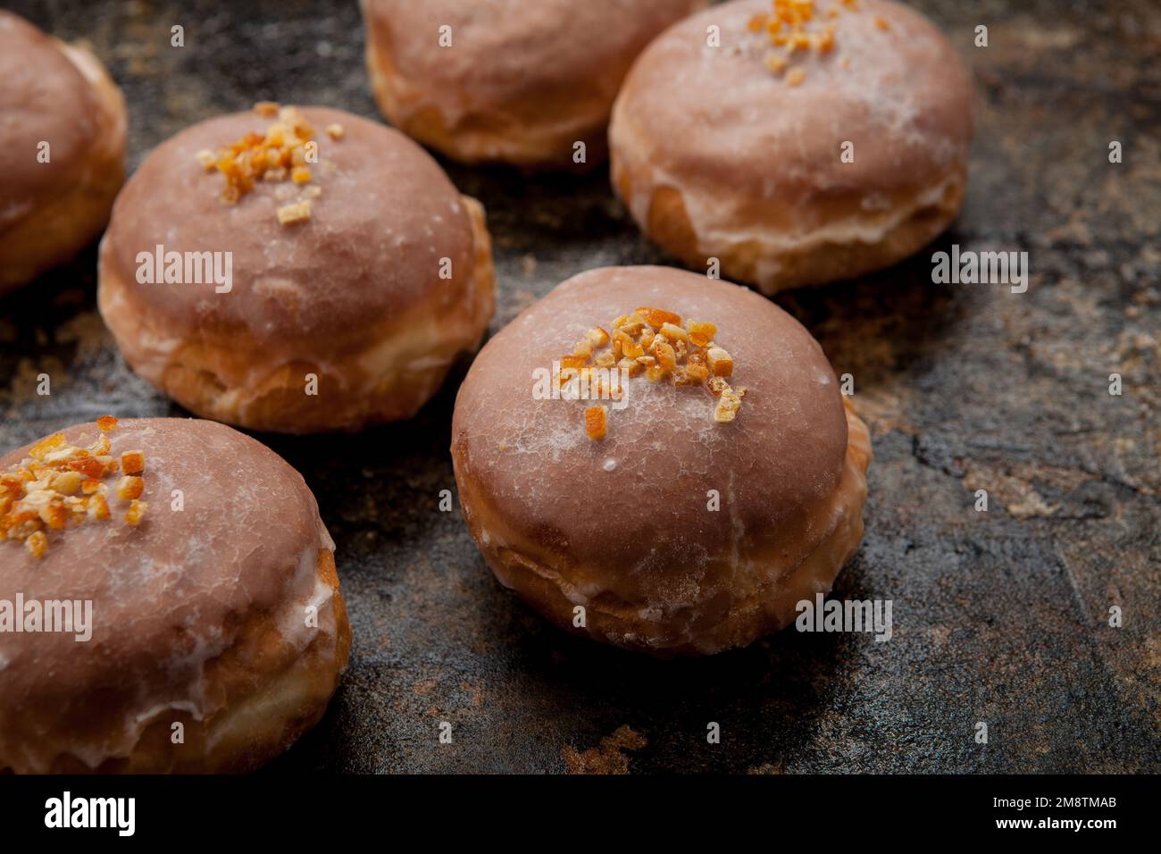 Donuts for Fat Thursday. Polish tradition - fresh donuts with icing and ...