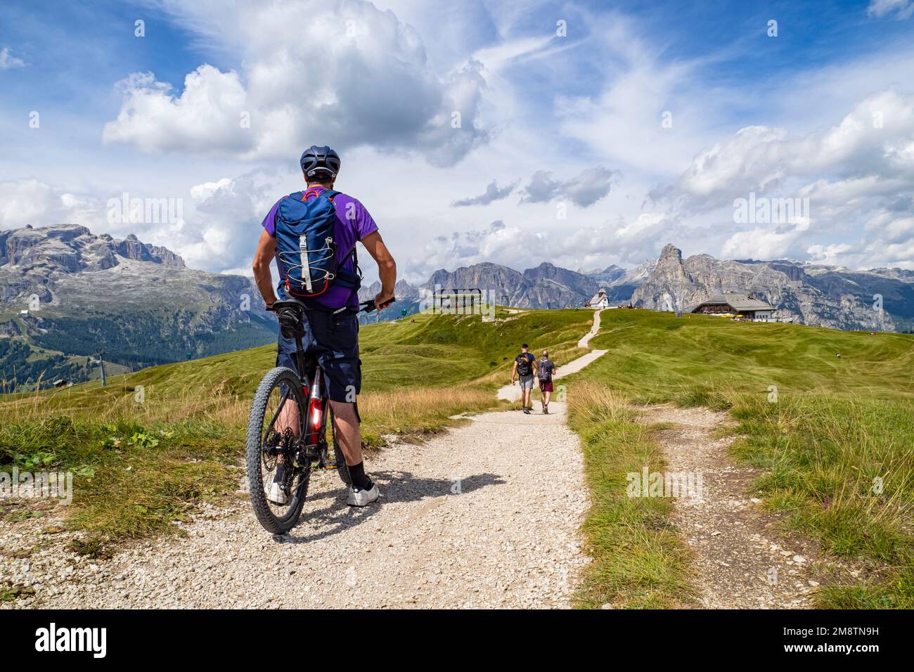 Cycling scene on the dolomites Stock Photo - Alamy