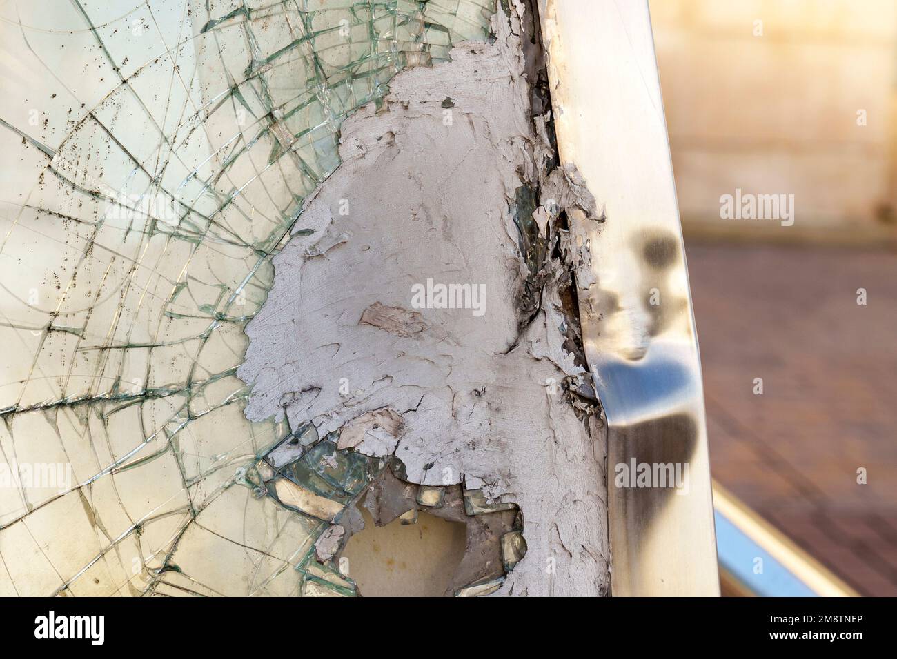 Shattered broken glass in damaged metal frame. Vandalism concept Stock ...