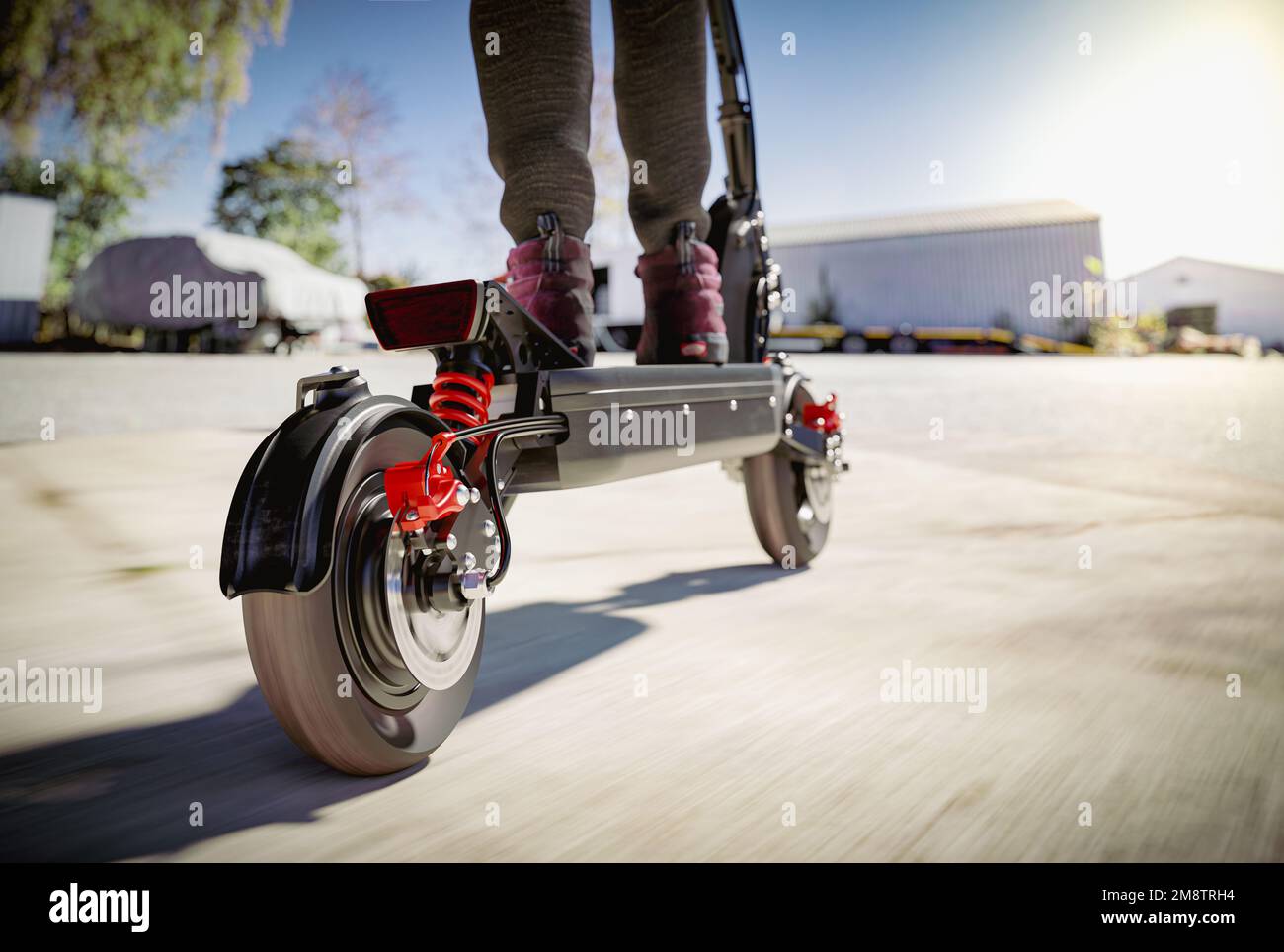 Electric scooter fast ride through the city - closeup to back wheel ...