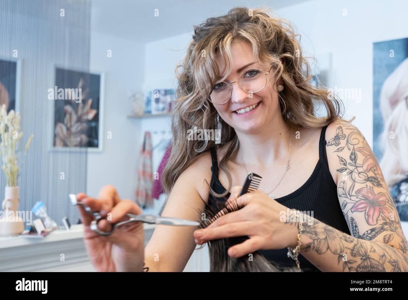 barber cutting a client in his salon Stock Photo - Alamy