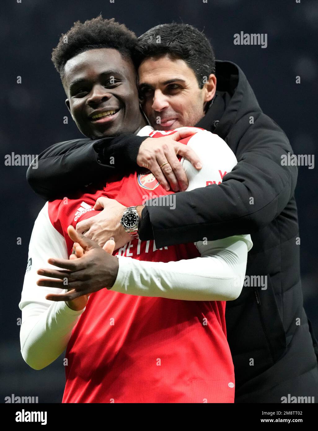 Arsenal's Bukayo Saka and Arsenal's manager Mikel Arteta celebrate their victory at the English ...