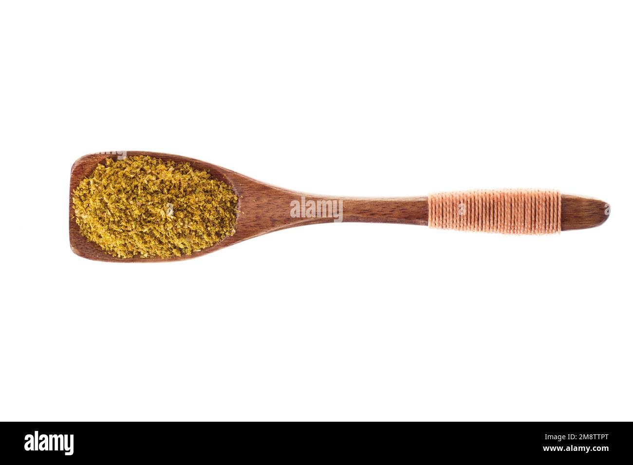 khmeli suneli in a spoon, top view. condiment isolated on white ...